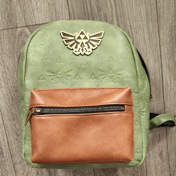 Bags | Green And Brown Backpack With Gold Zelda Emblem | Poshmark